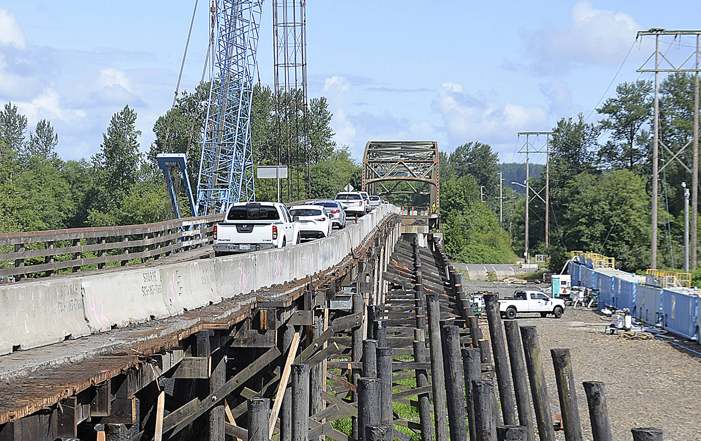 Wood trestle on SR 107 bridge making way for stronger concrete supports ...