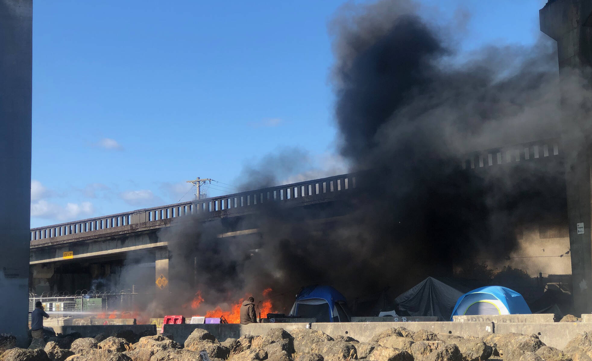 Fire breaks out at homeless camp | The Daily World